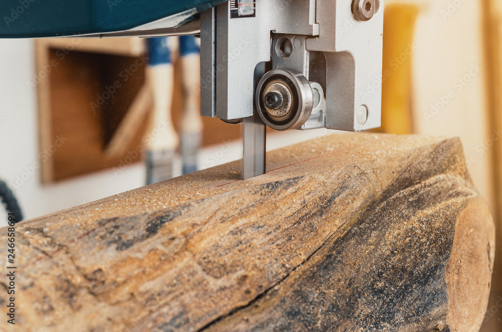 Band saw, the machine cuts the log on the boards. Woodworking, wood ...