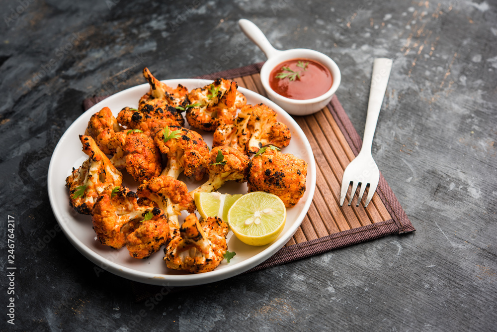 Tandoori Gobi / Roasted cauliflower Tikka is a dry dish made by ...