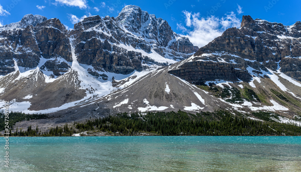 Crowfoot Mountain at Bow Lake - A panoramic Spring view of massive ...