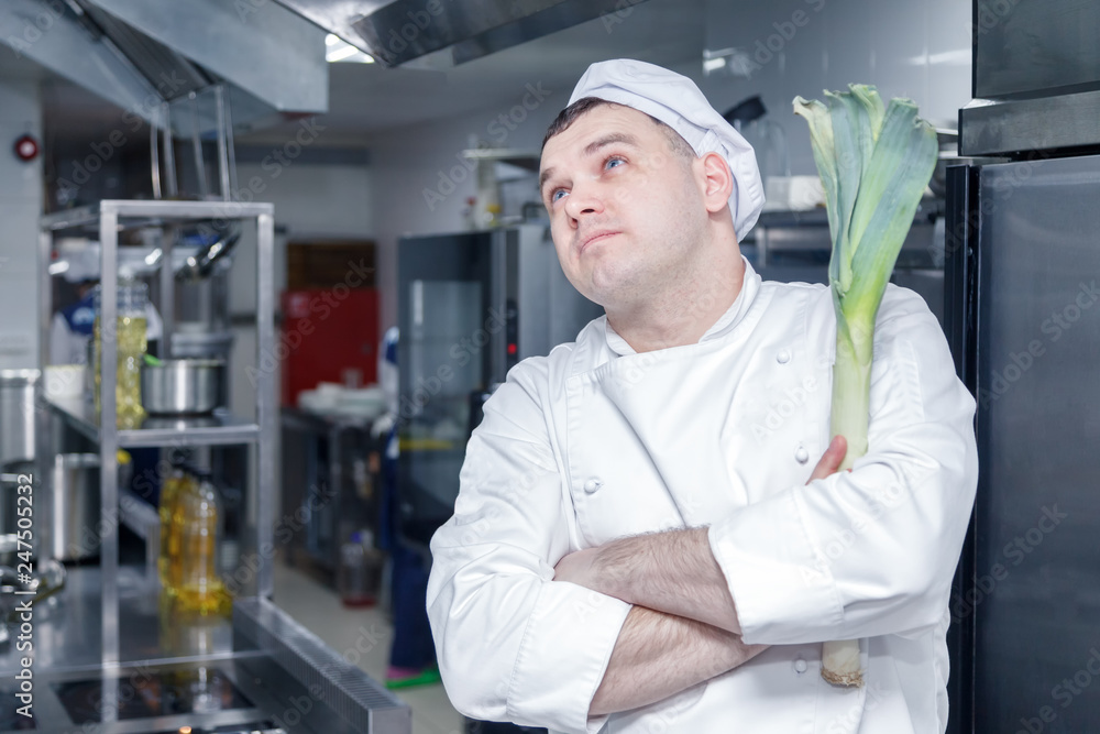 Foto de Stock Closeup man professional chef in white uniform composing ...