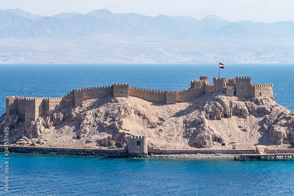 Ancient military fort Salah El Din Citadel on a small island on the ...