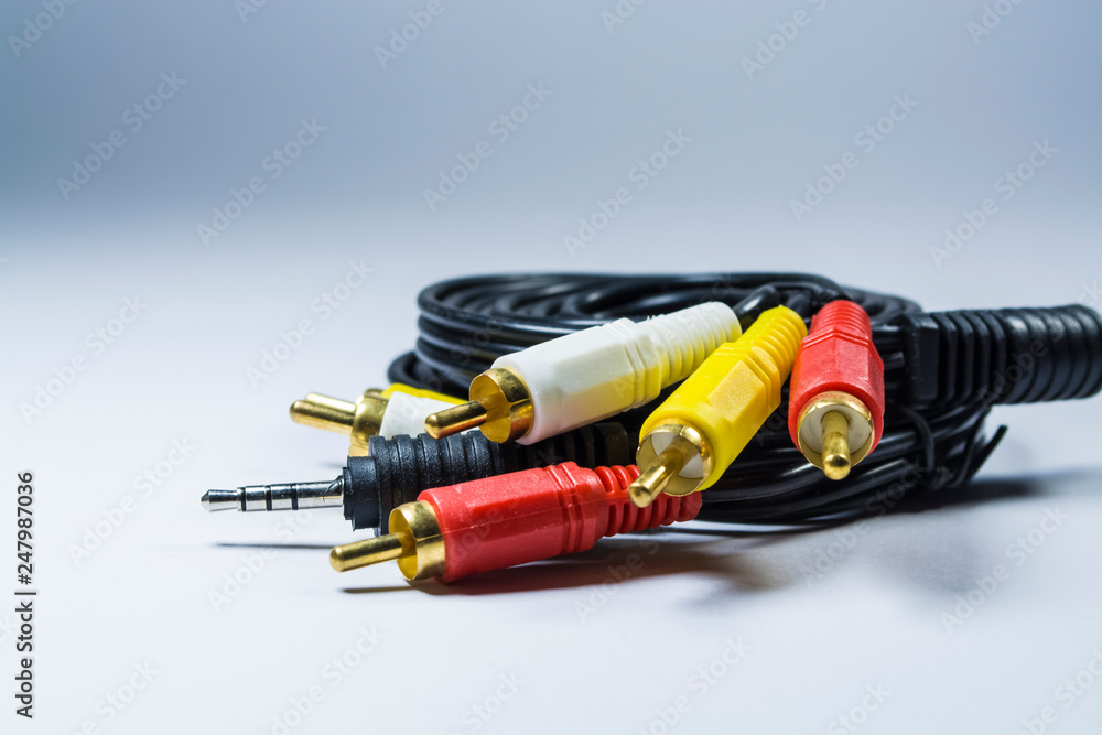 Hank of cables with multi-colored plugs a tulip. Black cord. White ...