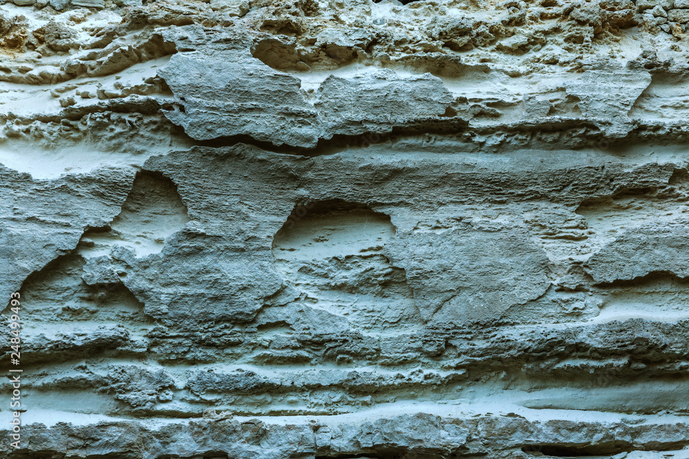 ภาพถ่าย Stock Picturesque background of collapsing surface of limestone ...