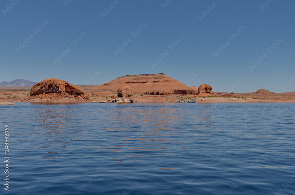 sandstone buttes on the shores of Lake Powell in Glen Canyon National ...