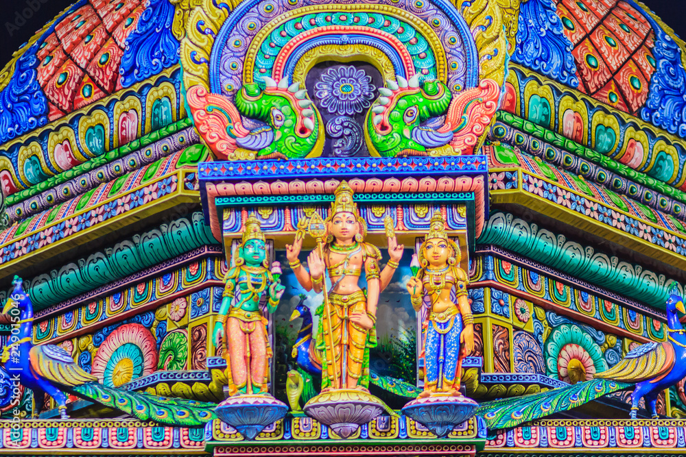 Colorful night view of indian gods sculpture at Sri Maha Mariamman ...