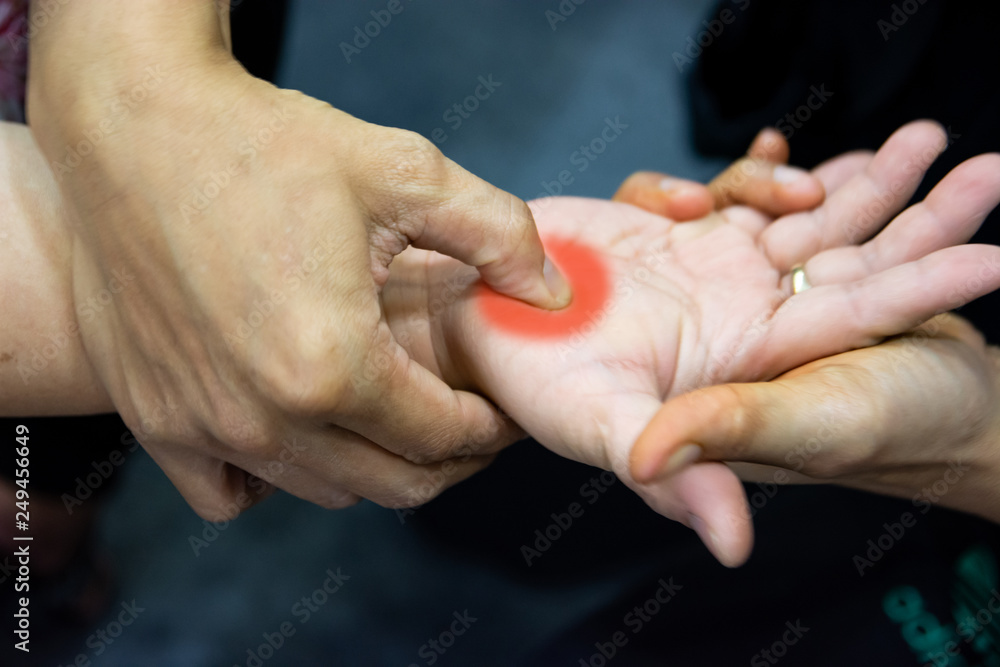 Massage to relieve Trigger finger lock symptoms Stock Photo | Adobe Stock