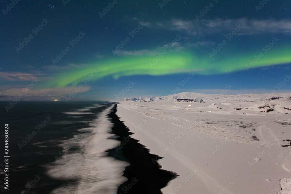 Aurora borealis, Iceland. Green northern lights. Starry sky with polar ...