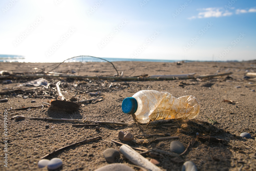 Marine pollution: plastic waste on the beach. Stock Photo | Adobe Stock