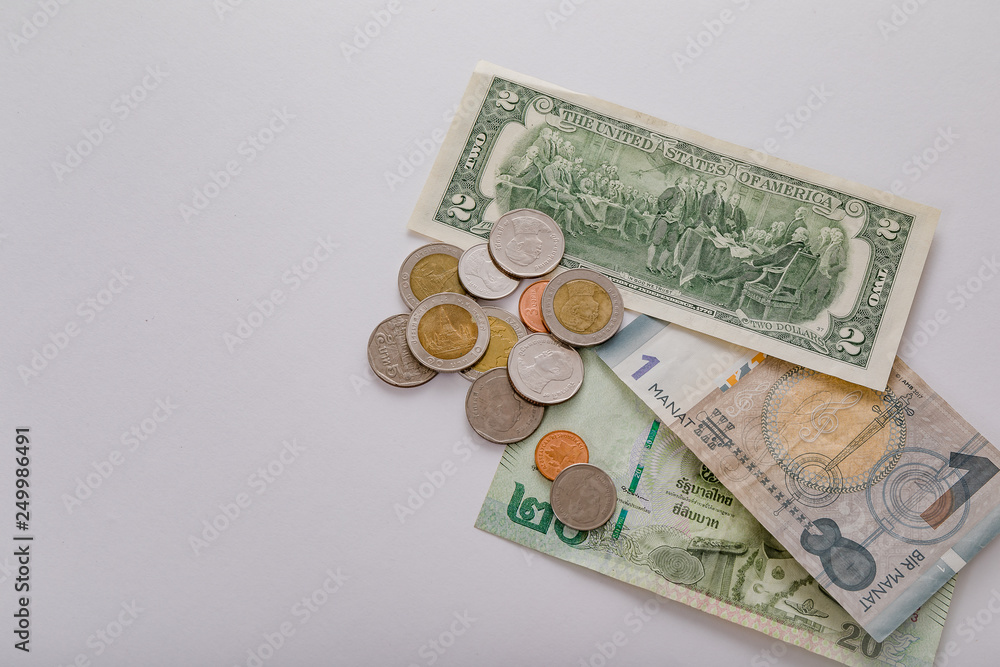 National currency of different countries. Banknotes and coins. The Thai ...