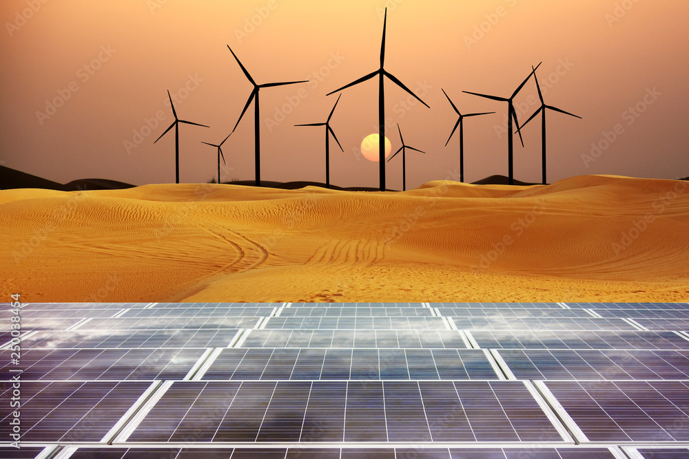 Renewable energy with windmills and solar panels in dessert at sunset ...