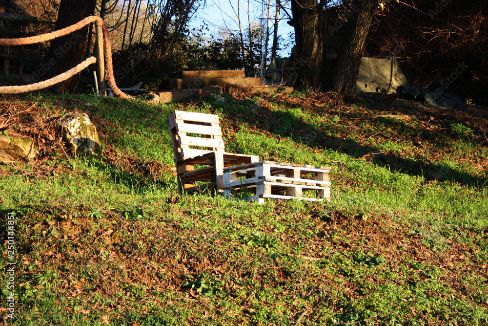 impromptu chair. lying down in wood. Spartan craft creation made with ...