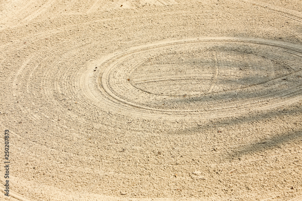 close up background of the rough sand field texture with many circle ...