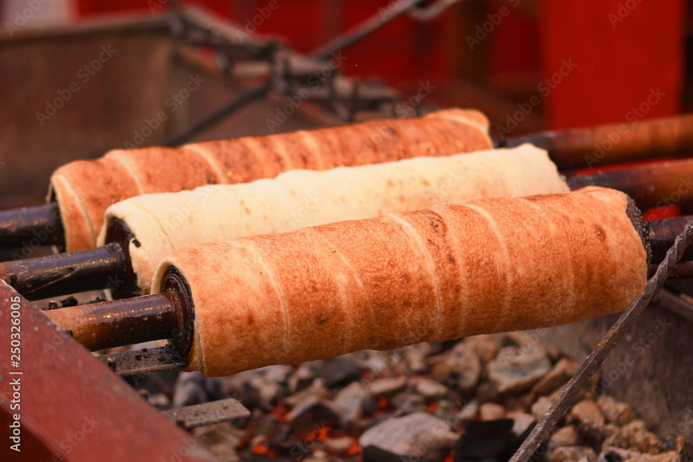 Hungarian Kurtos-Kolac prepared on the grill, at a traditional food ...