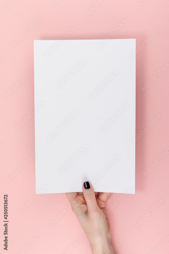 Woman hands with blank A4 paper sheet mockup Stock Photo | Adobe Stock