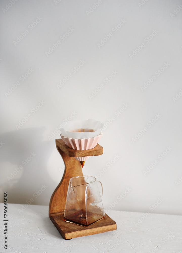 Wooden coffee drip station on white background. Free space for design ...