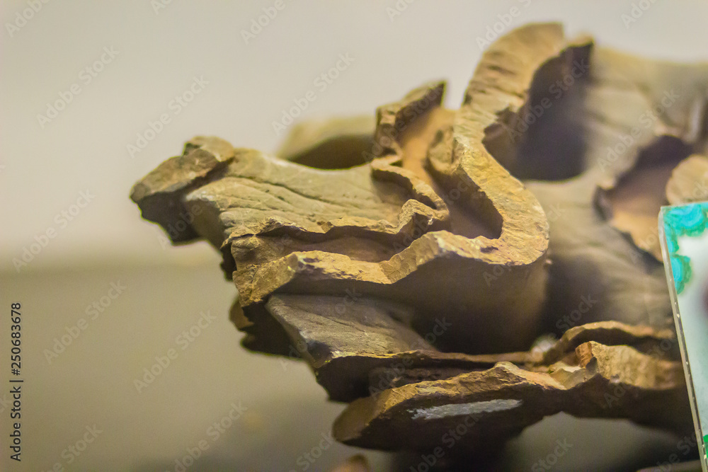 Stock-Foto „Folded rock from mining for education. Folds in rocks vary ...