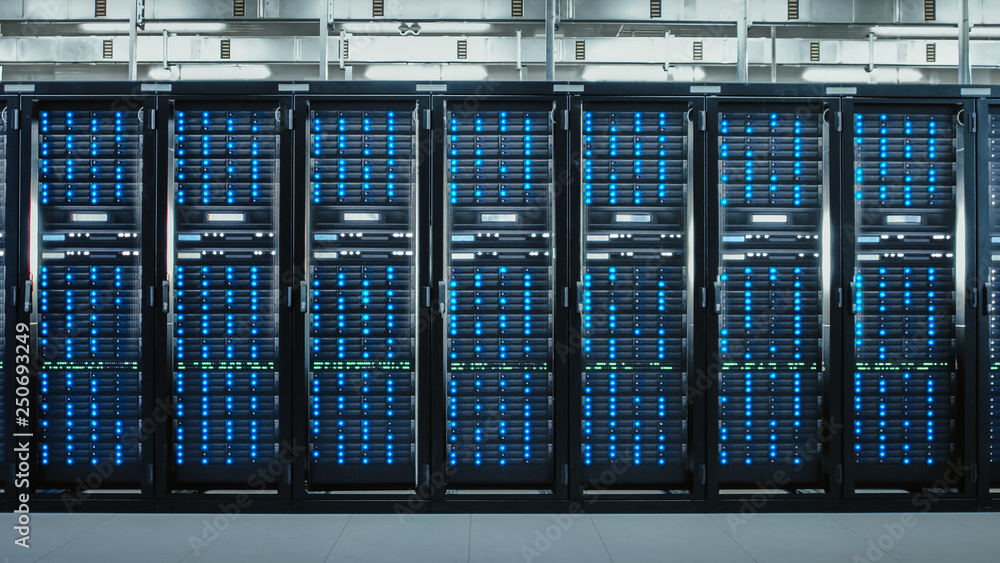 Camera Slide-Trough Shot of a Working Data Center With Rows of Rack Servers. Led Lights Blinking ...