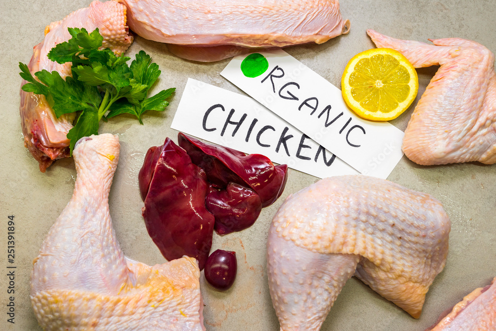 Foto de Stock Parts of organic chicken (leg, breast, wing, claw and ...