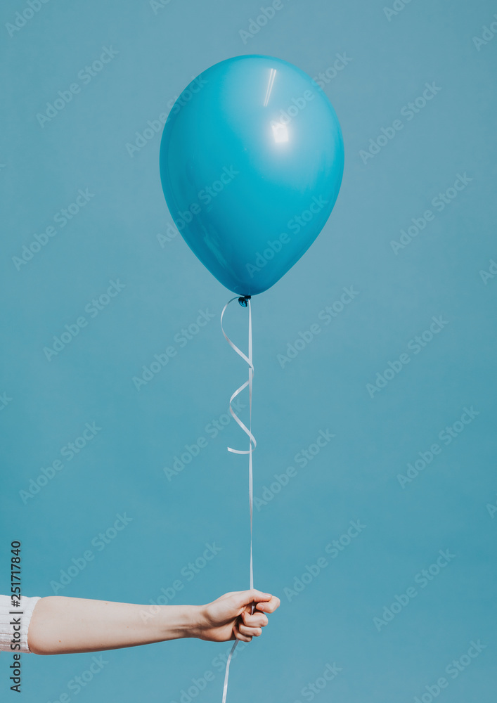 Helium balloon on a string Stock Photo | Adobe Stock