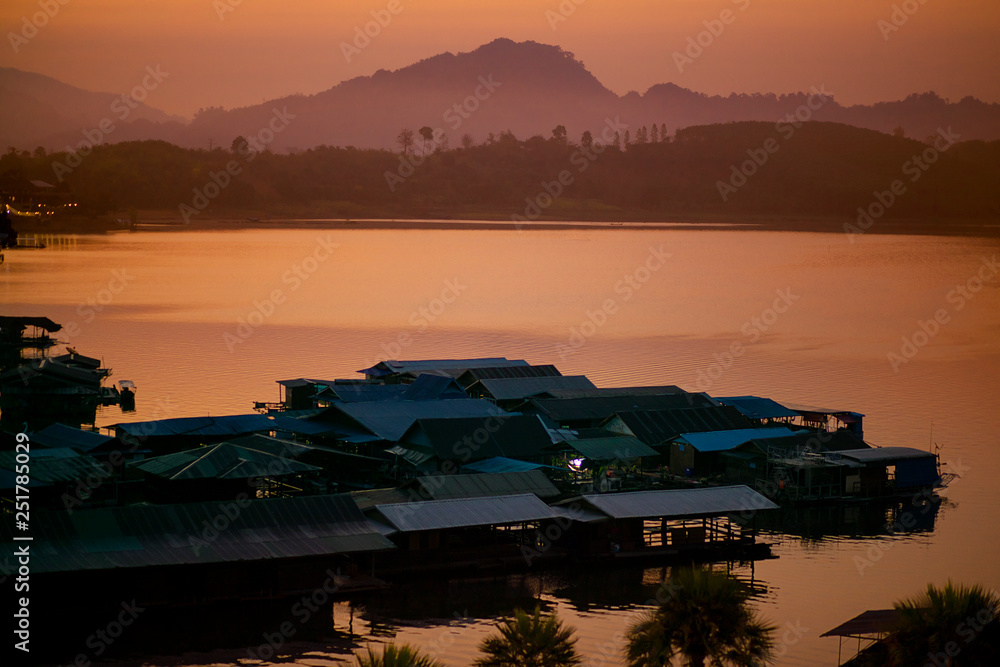 morining light of floating home in sangklaburi lake western terri of ...