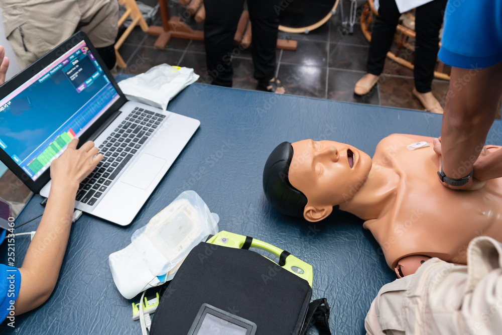 First aid training : automated external defibrilator and mannequin ...