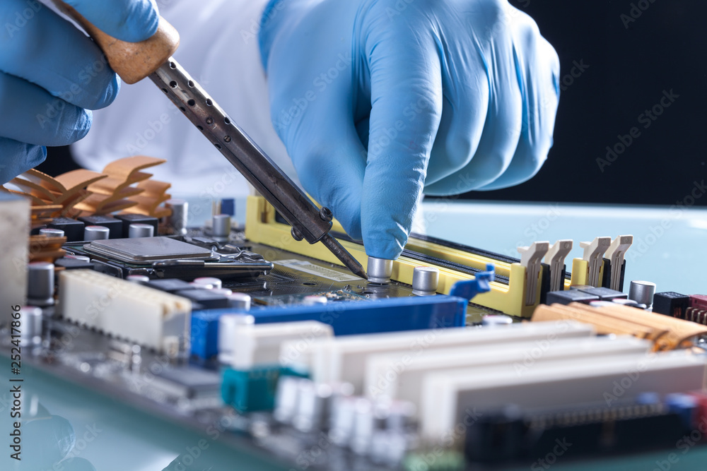 The scientist holds the computer part Stock Photo | Adobe Stock