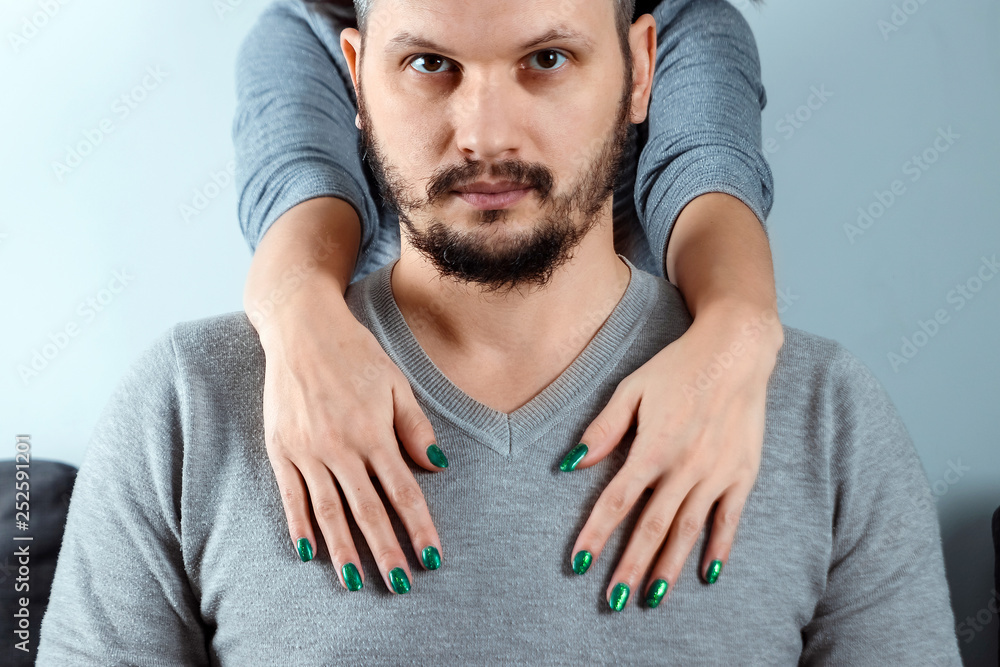 Sexy woman, hands with green nails hugging a man. Businessman, female ...