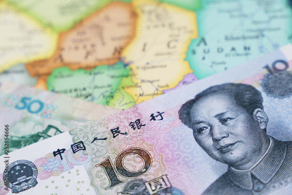 Yuan currency on the map of Africa. Chinese investment and trading with ...