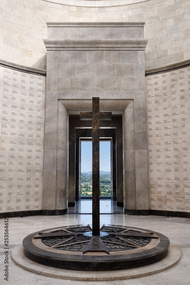 Central cross with names of the interred and view of Italian ...
