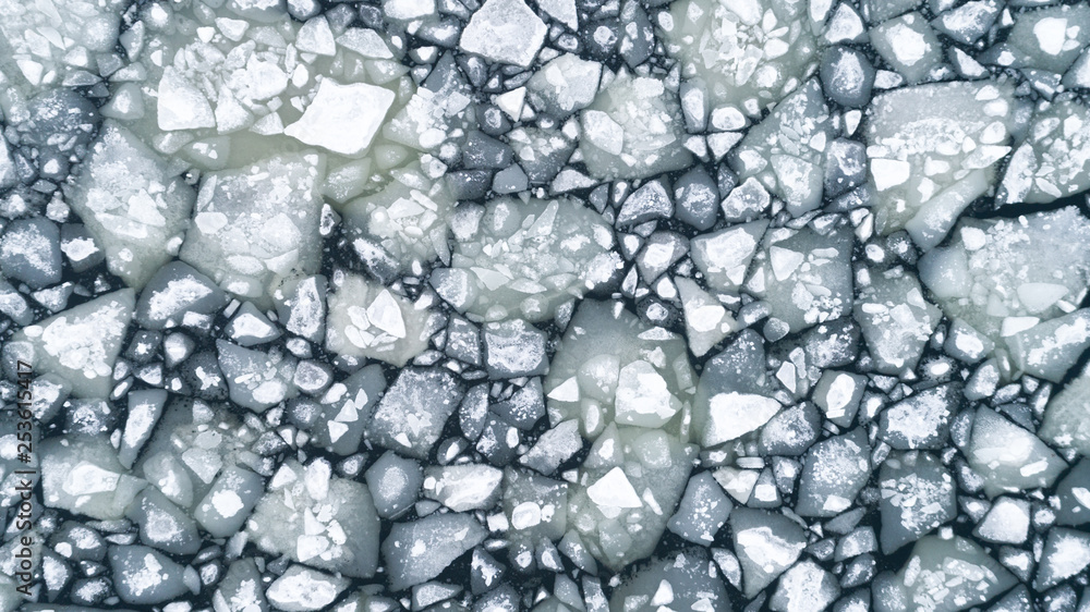 Ice texture broken into pieces of different shapes and sizes. Climate ...