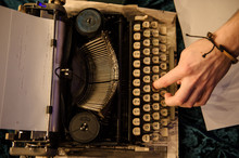 Man Typing On The Typewriter Free Stock Photo - Public Domain Pictures