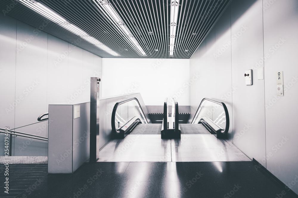 Photo Stock A contemporary doubled escalator and stairway in an airport ...