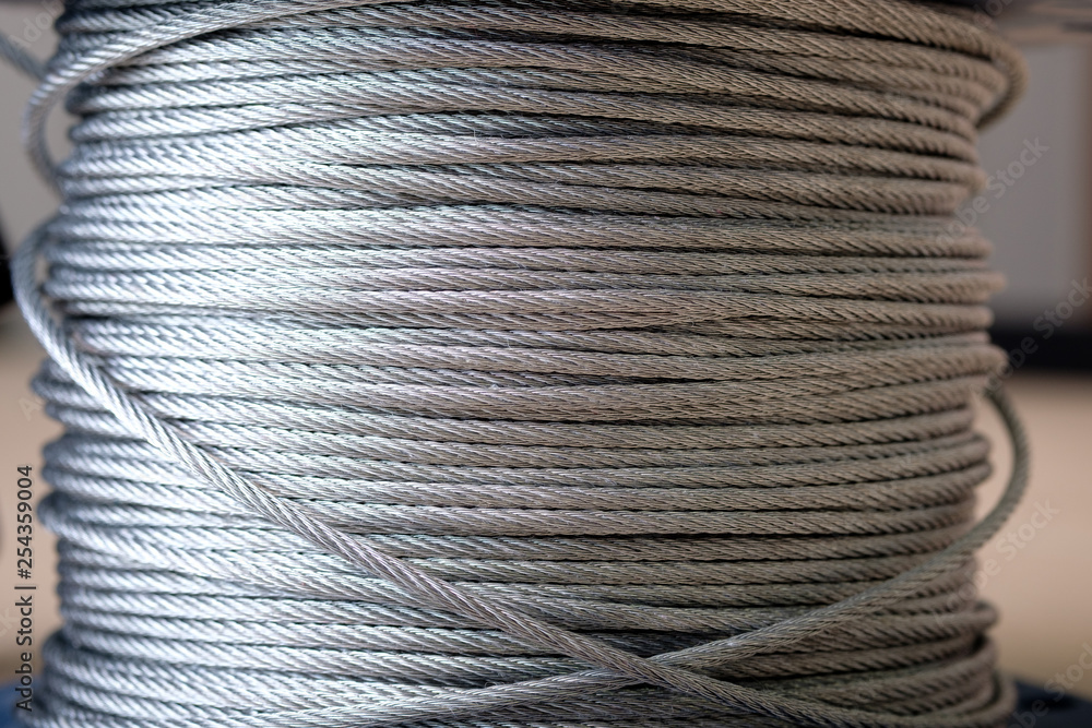 large coil of steel cable, steel braided cable is wound into a roll ...