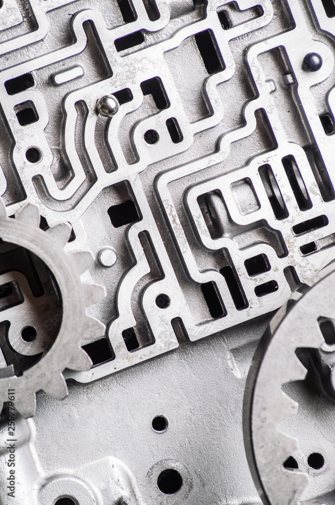 Background and pattern of old metal parts of the gearshift box. Hydro ...