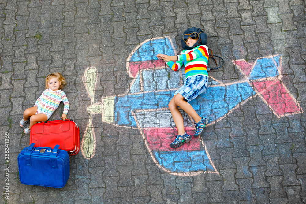 Two little children, kid boy and toddler girl having fun with with ...