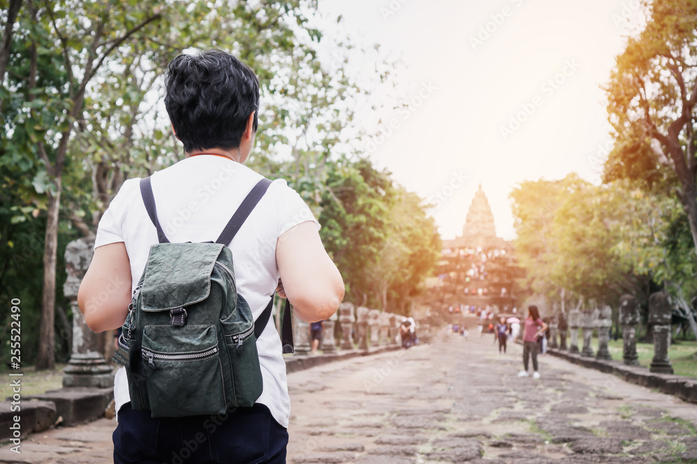 Older Asian woman traveler backpacker looking Historical Park ...