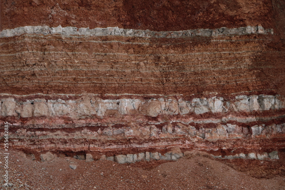 texture of different layers of clay underground in clay quarry after ...