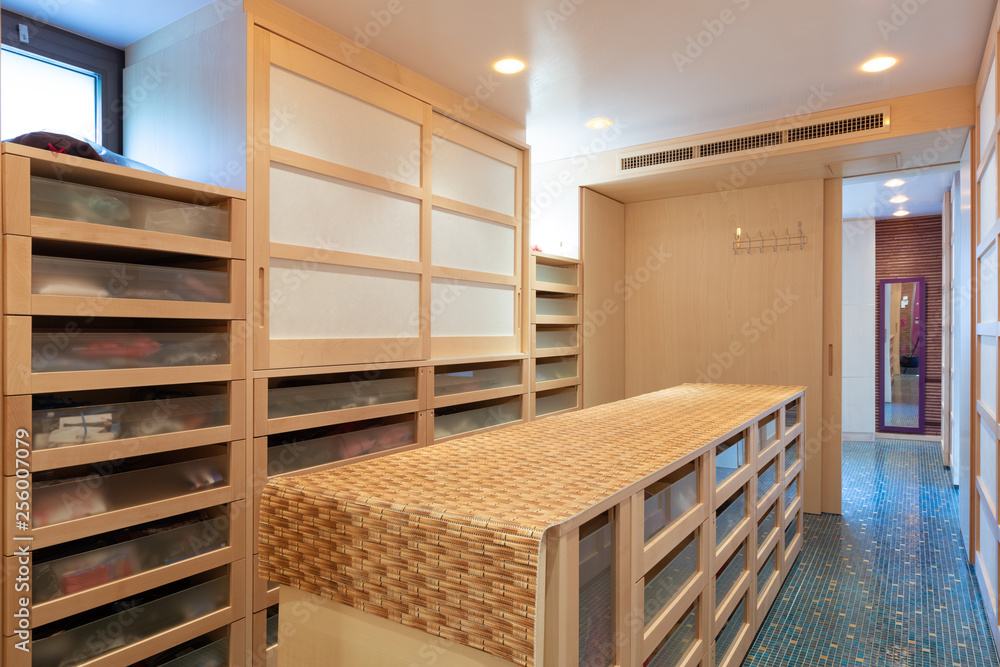 Giant walk-in closet with drawers Stock Photo | Adobe Stock
