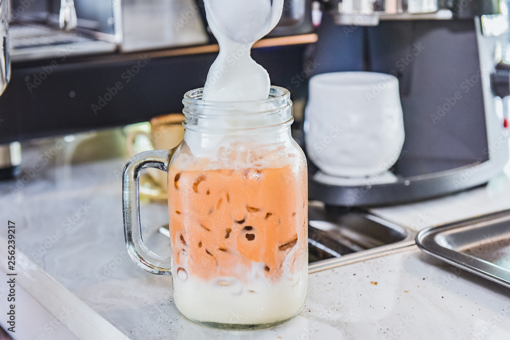 Ice thai tea with milk, traditional Indian drink is iced tea or chai ...