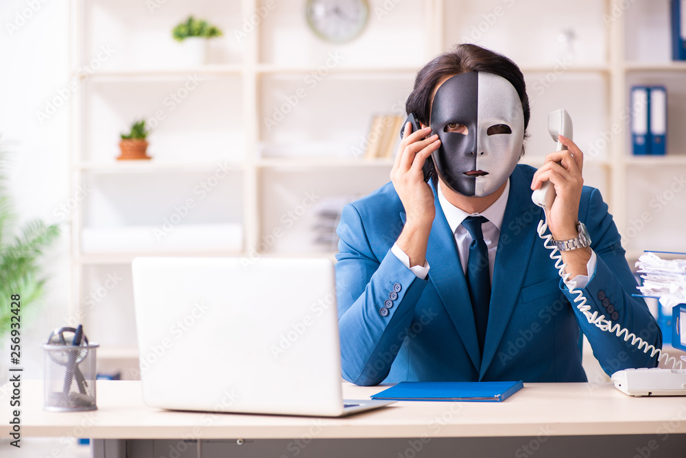 Male employee in the office in industrial espionage concept Stock Photo ...
