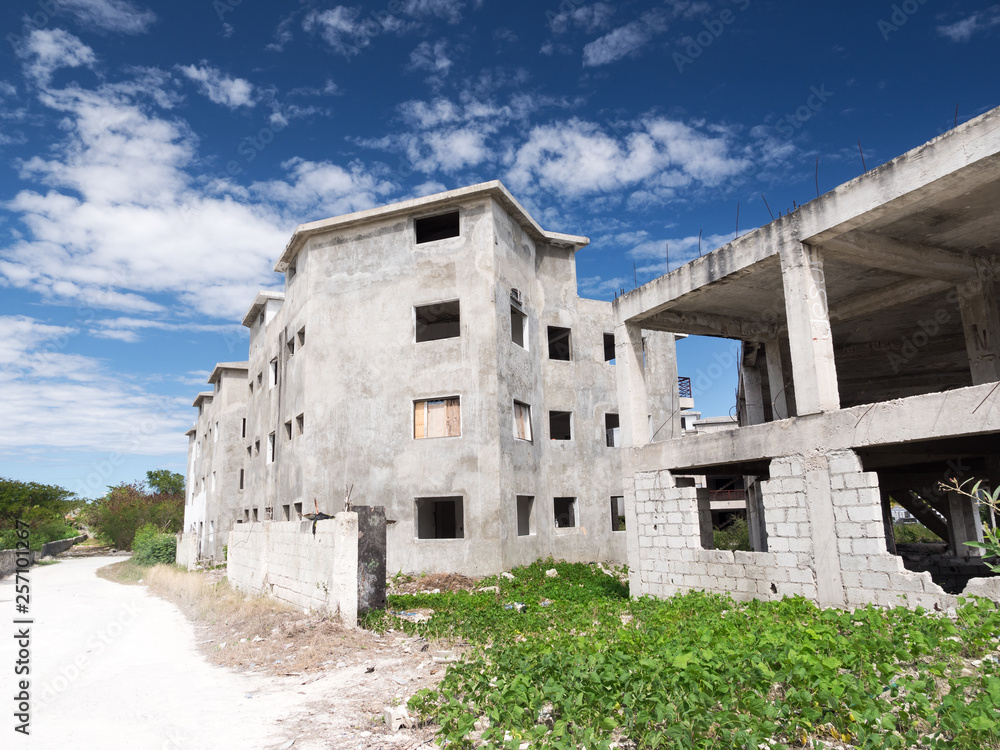 Unfinished and abandoned construction of typical caribbean building ...