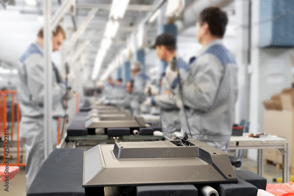 TV Assembly line at the factory. Background factory workers Stock Photo ...