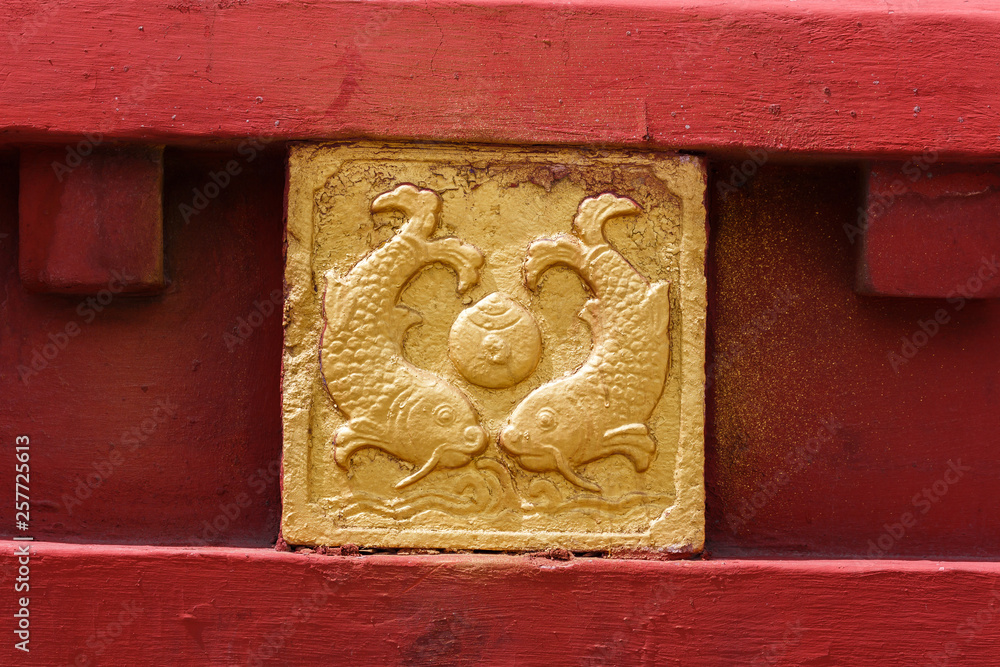 LHASA, TIBET / CHINA - July 30, 2017: Two golden fishes - part of the ...