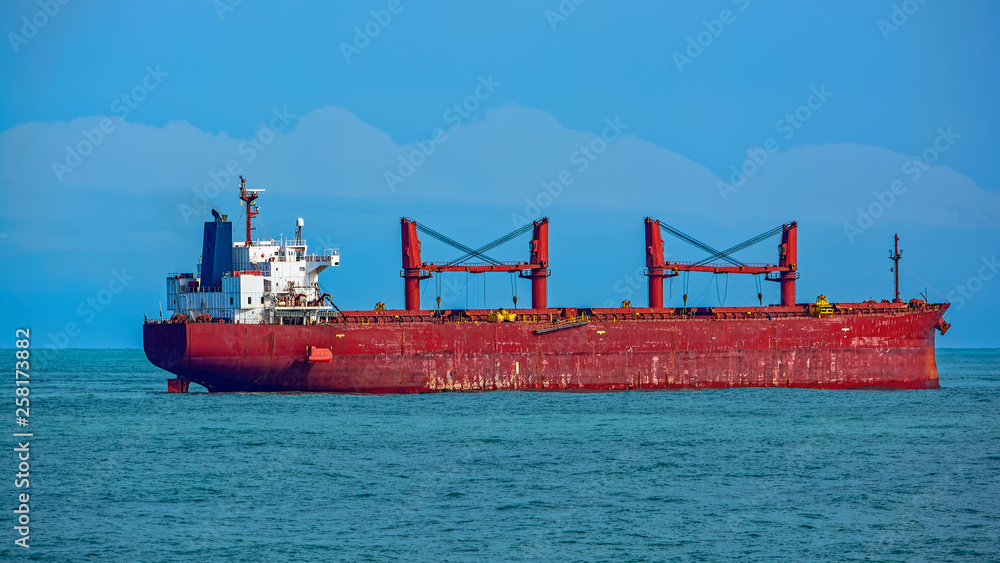 Bulk carrier vessel is awaiting loading of bauxite ore at outer ...