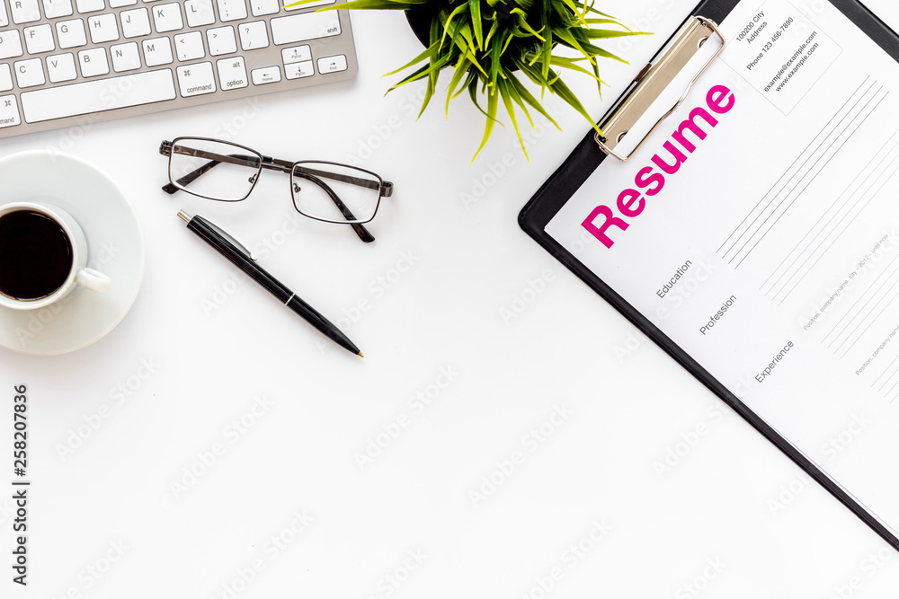 Review resumes of applicants set with coffee, glasses, keyboard white ...