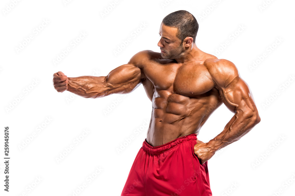 Body Builder Flexing Muscles Stock Photo | Adobe Stock