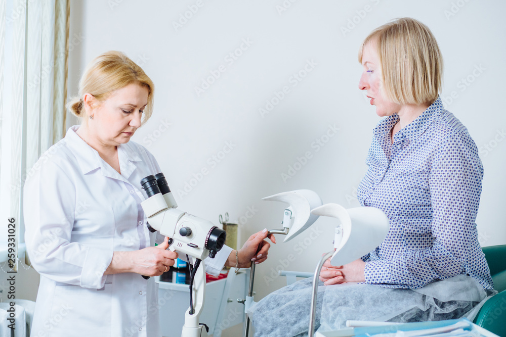 Mature woman patient with a senior gynecologist during the consultation ...