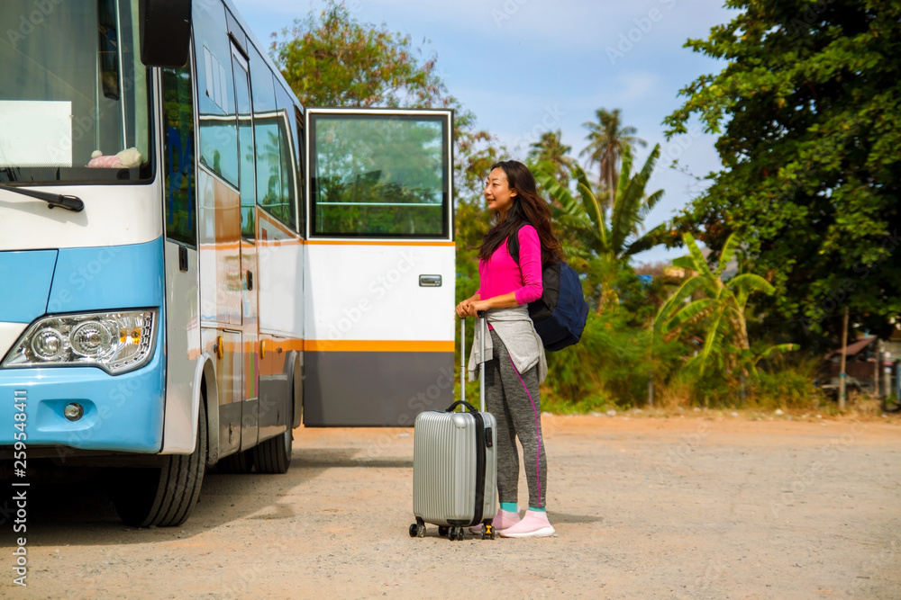 Asian young woman traveler getting on the tourist bus for travel. Stock ...