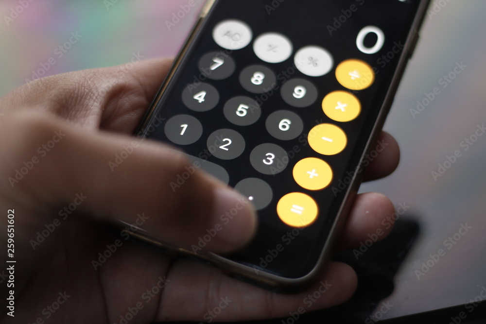 Using calculator app - point of view Stock Photo | Adobe Stock Using calculator app - point of view Stock Photo | Adobe Stock