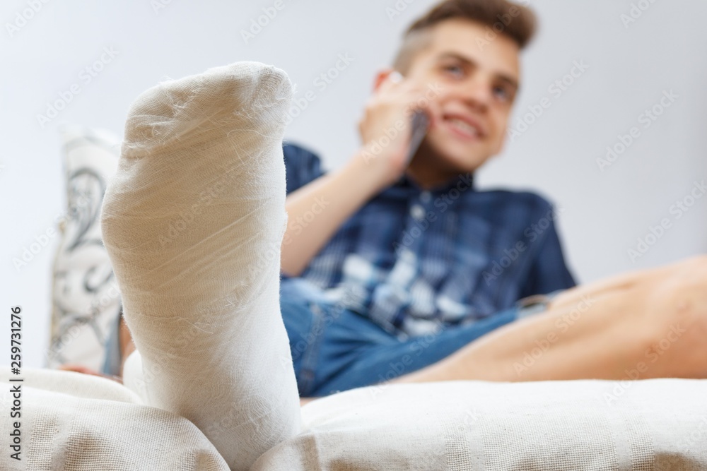 Leg injury plaster bone fracture, foot. Stock Photo | Adobe Stock